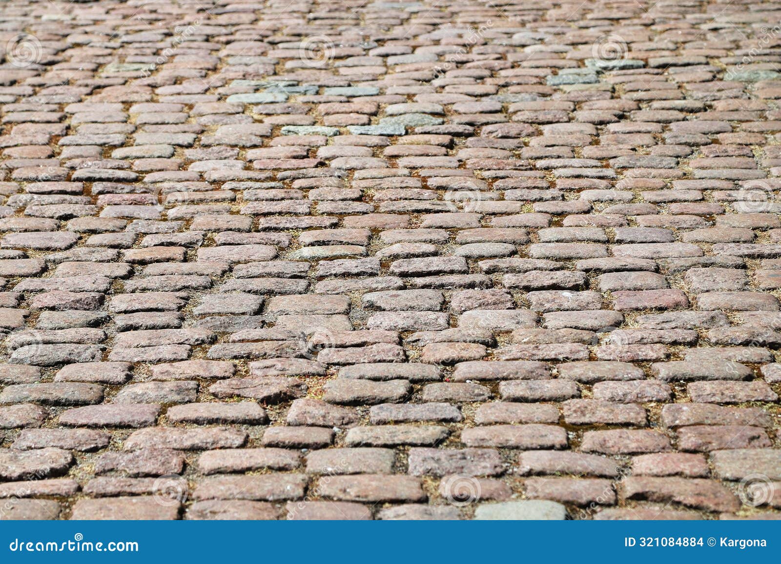An Old Stoneblock Pavement Cobbled With Rectangular Natural Stone ...