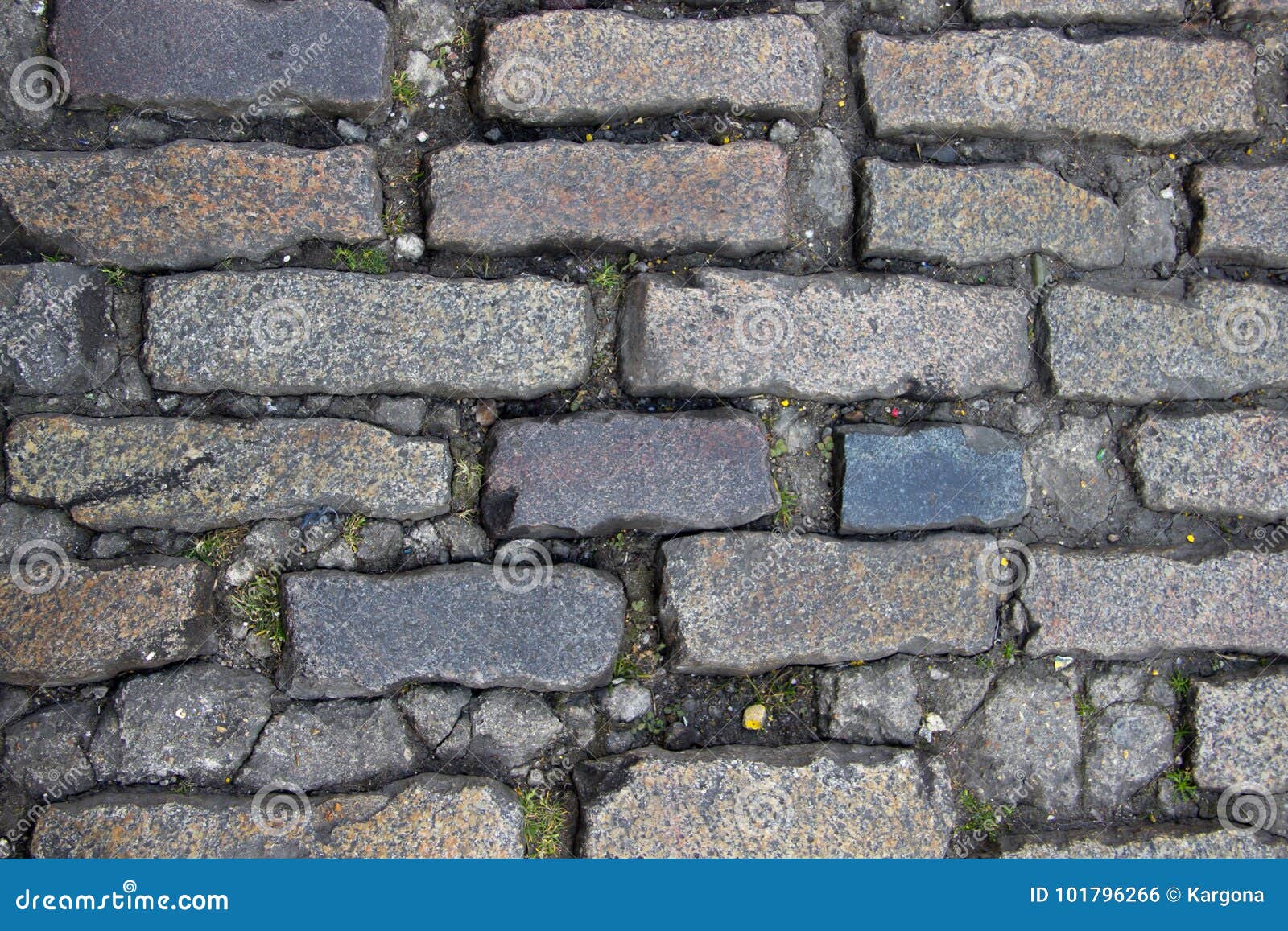 An Old Stoneblock Pavement Cobbled With Rectangular Natural Stone ...