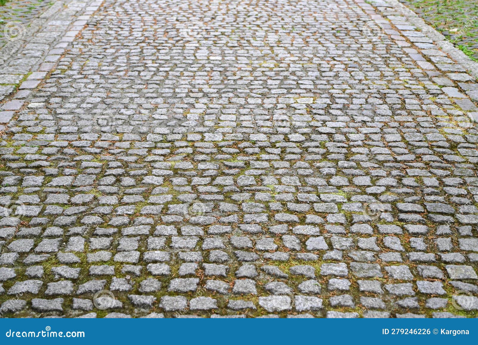 An Old Stoneblock Pavement Cobbled With Rectangular Granite Blocks ...