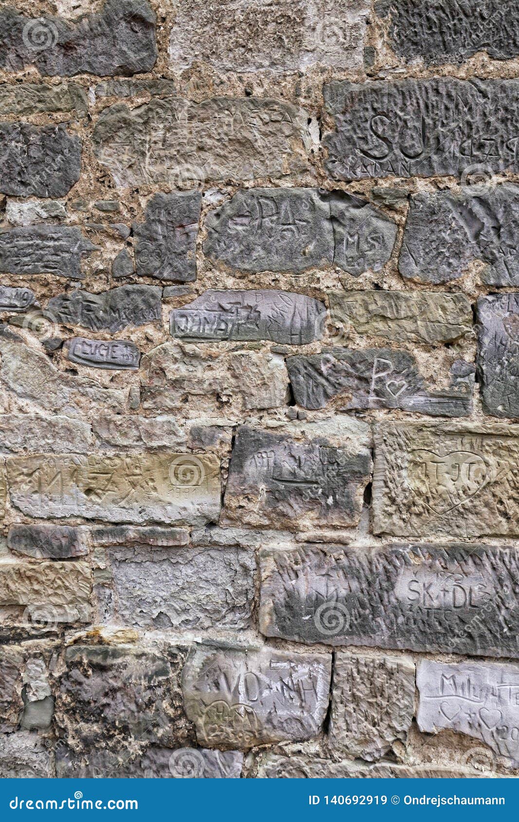 Old Stony Wall with Engraved Letters, Numbers and Dates Stock Image ...