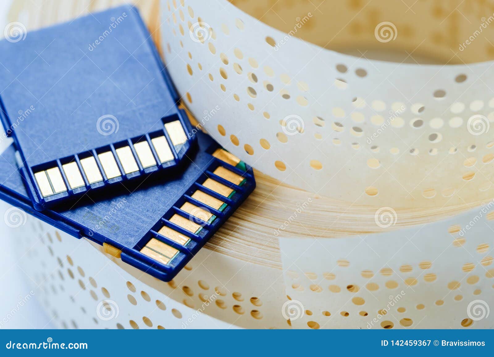 Old Storage Paper Obsolete Punched Tape and Sd Card, Flash Stock Image ...