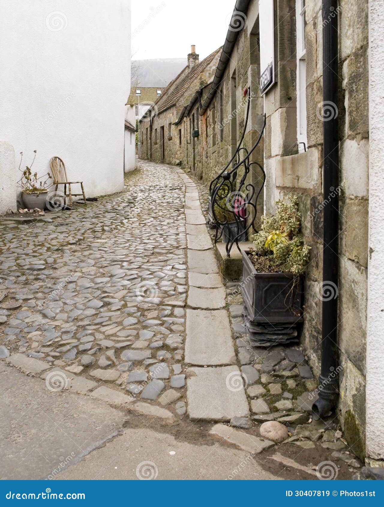 Old street stock image. Image of homes, flowers, gully - 30407819