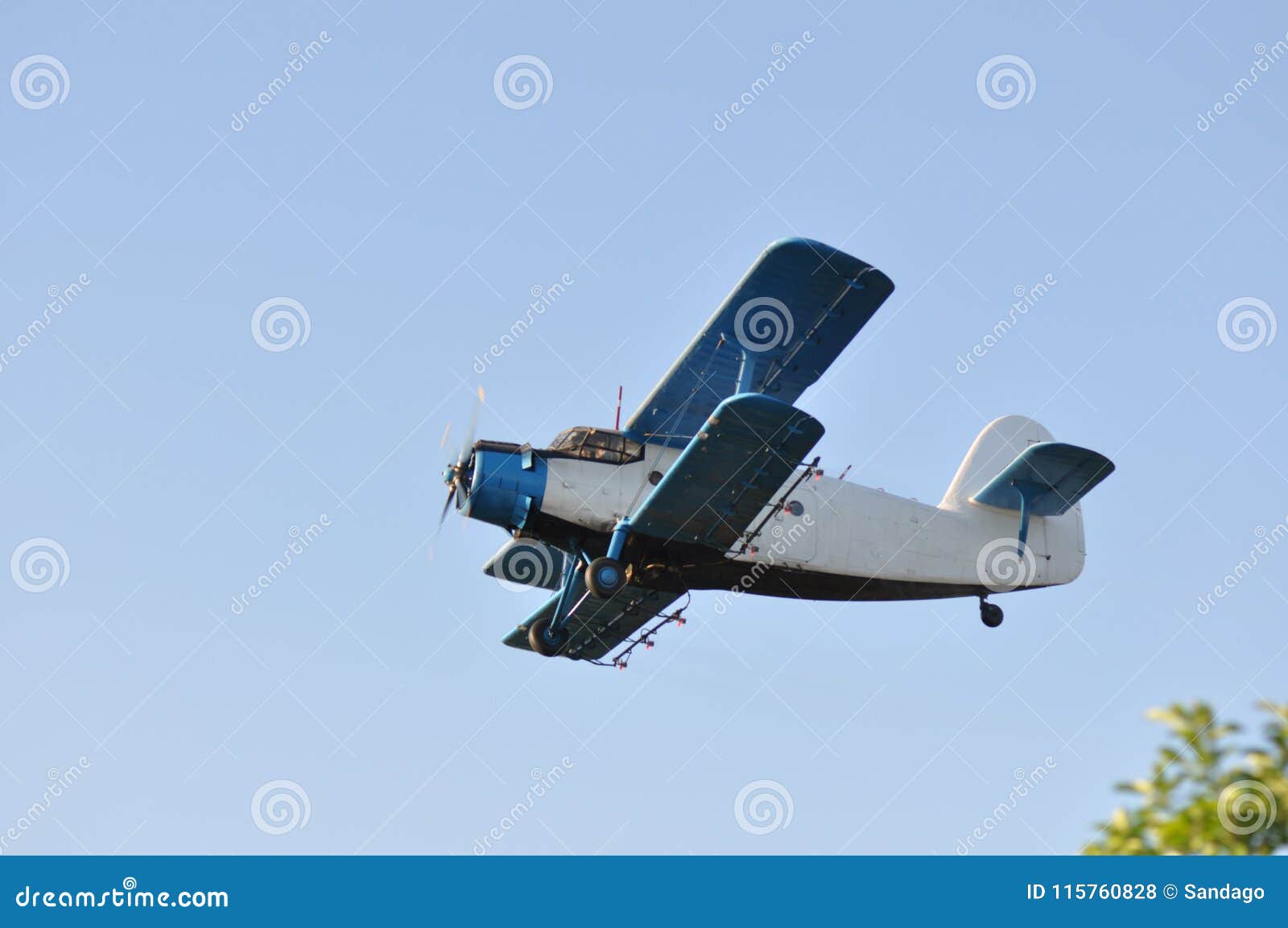 Old Plane Flying and Spraying the Crops Stock Photo - Image of landing ...