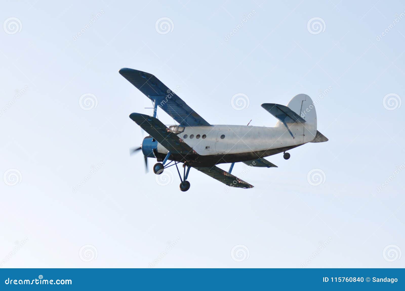 Old Plane Flying and Spraying the Crops Stock Photo - Image of cloudy ...