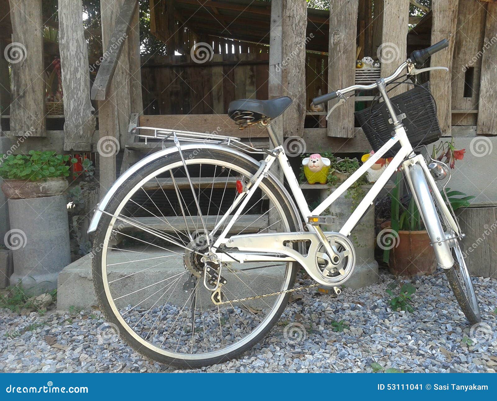 Old Style Rusty White Bicycle and Wooden Wall Editorial Photo - Image ...