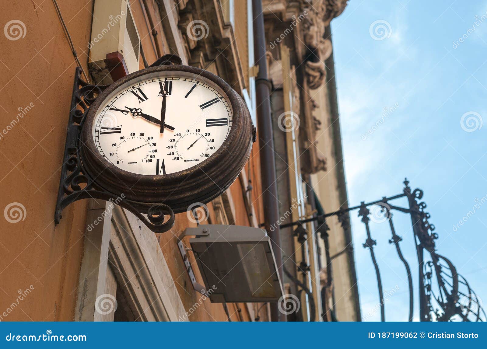 Old Style Street Clock at 10 am in Italy Stock Photo - Image of ...