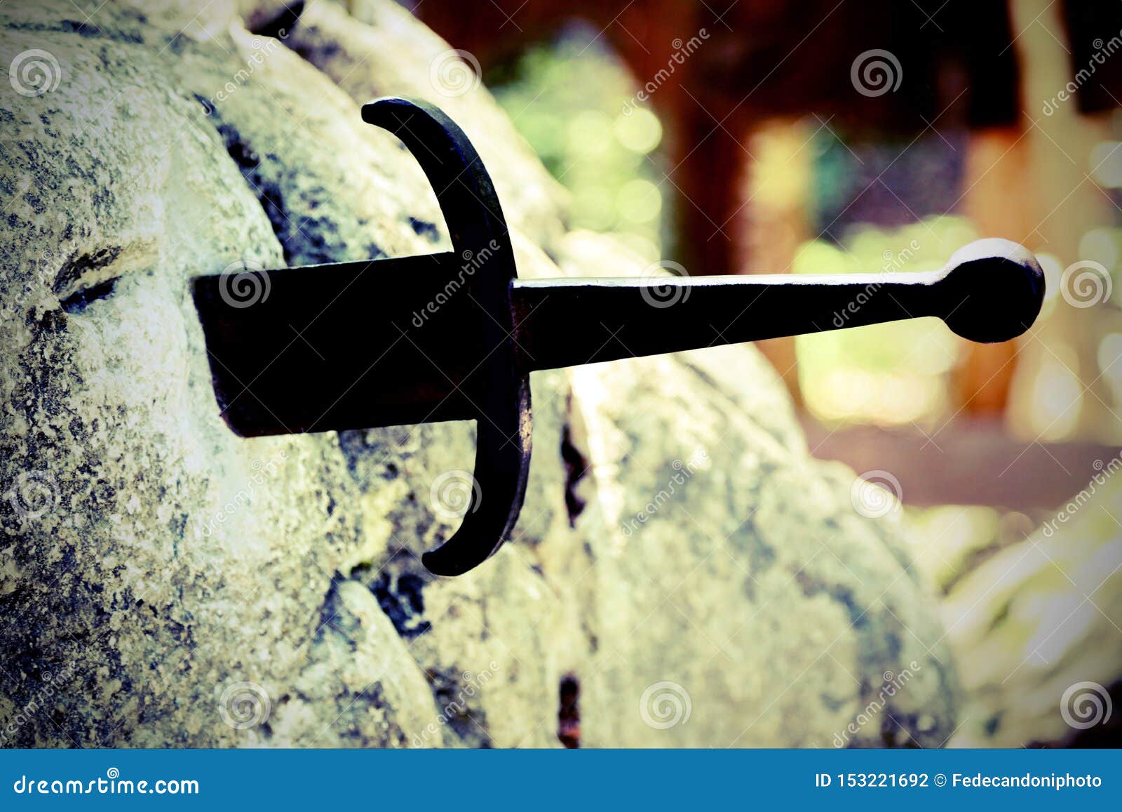 Old sword in the stone stock photo. Image of welsh, vintage - 153221692
