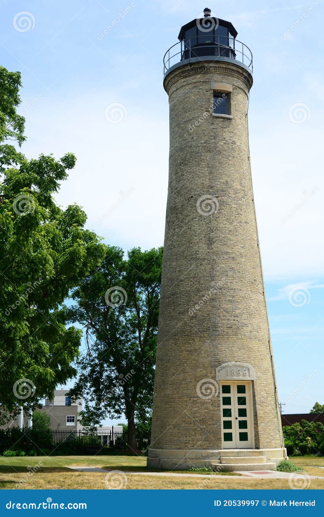 Old Tan Brick Lighthouse stock image. Image of wisconsin - 20539997