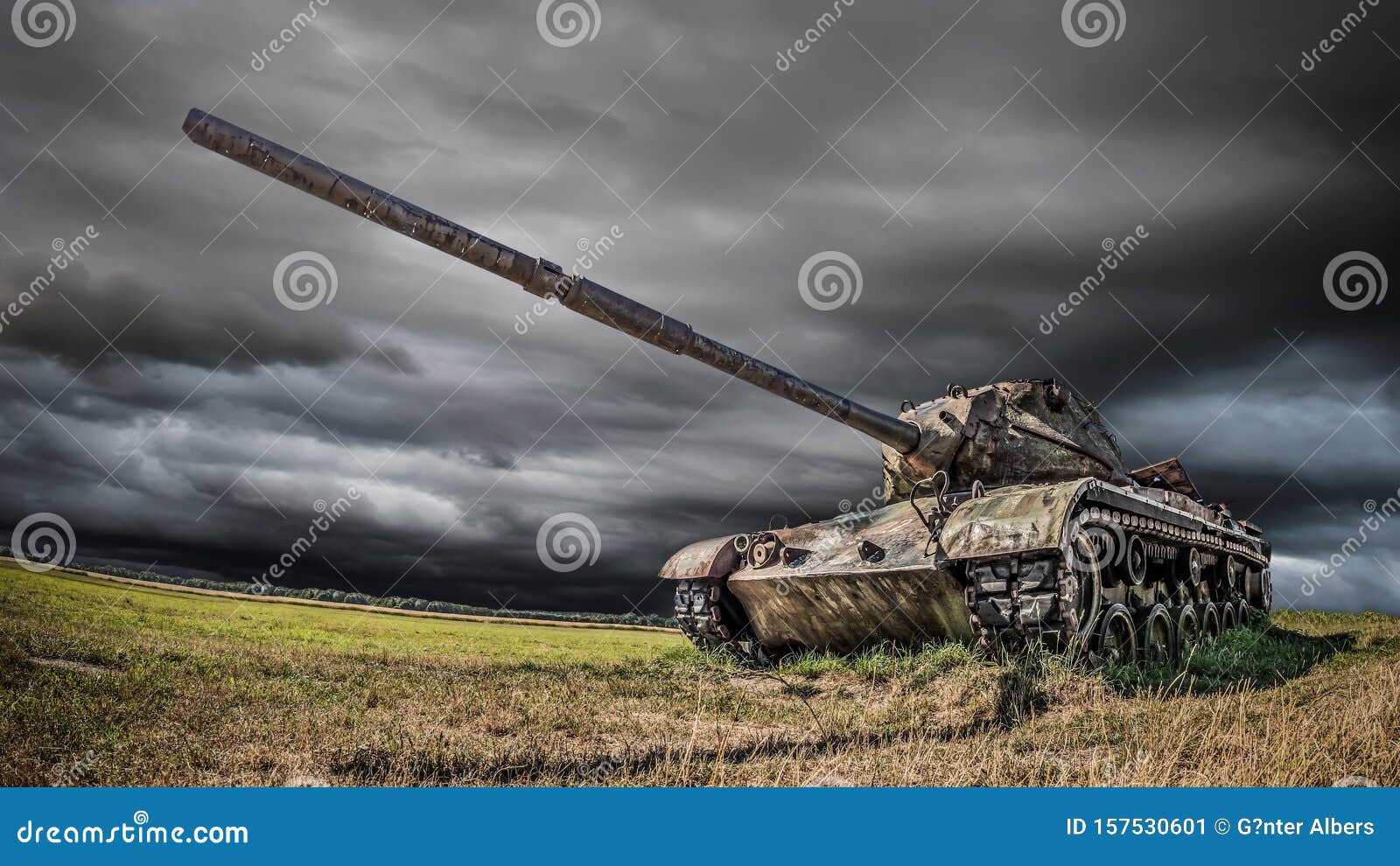 Old Tank with Dark Gray Clouds in the Background Stock Image - Image of ...