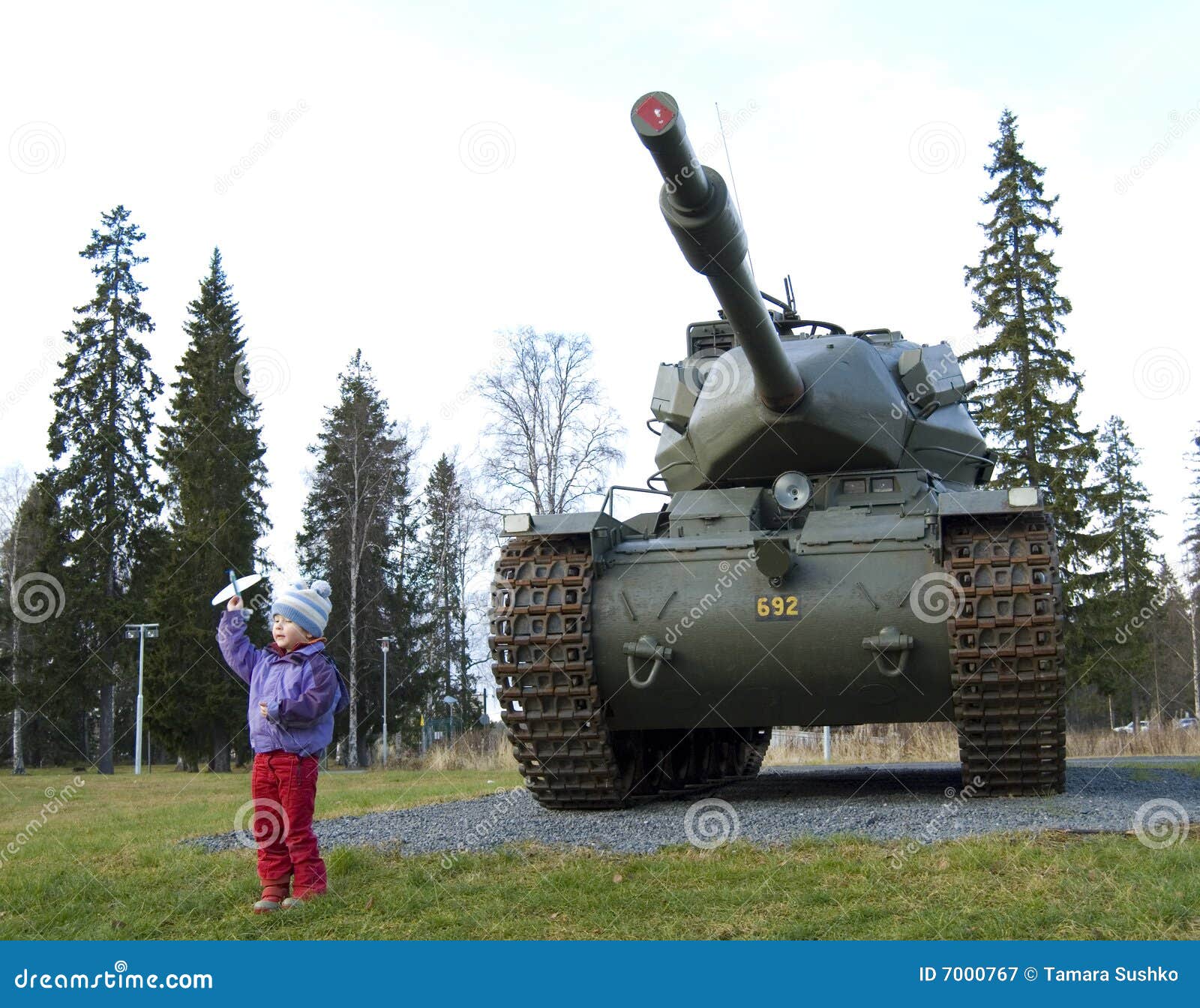 Old tank and girl in Boden stock image. Image of metal - 7000767
