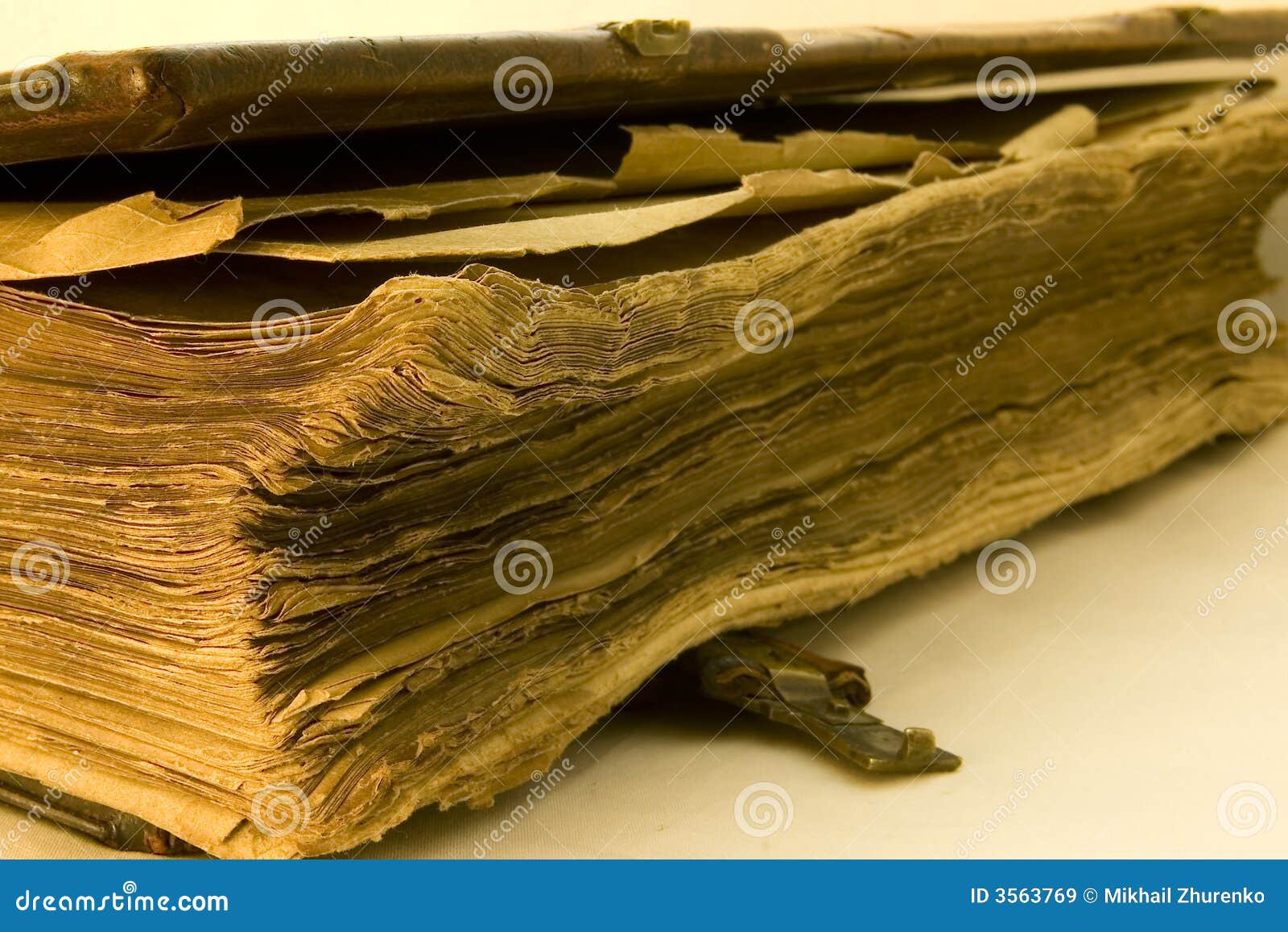 Old Tattered Book On A Wooden Table. Reading By Candlelight. Vintage ...