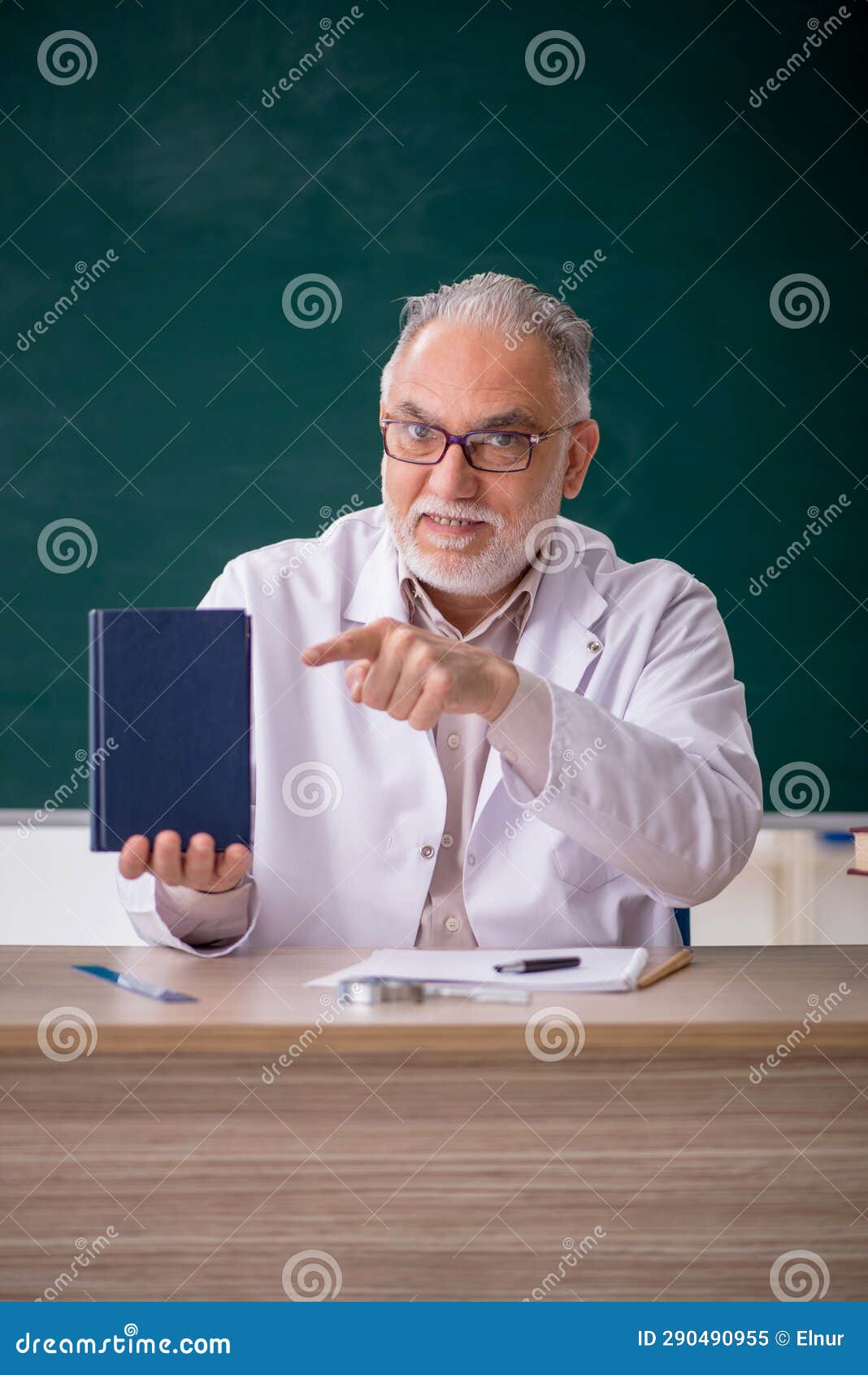 Old Male Teacher in Front of Green Board Stock Image - Image of ...