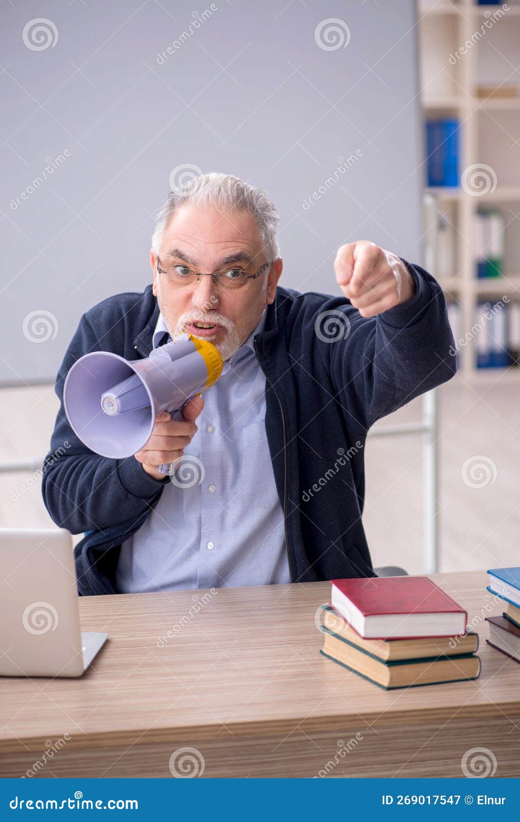 Old Male Teacher Holding Megaphone in the Classroom Stock Image - Image ...