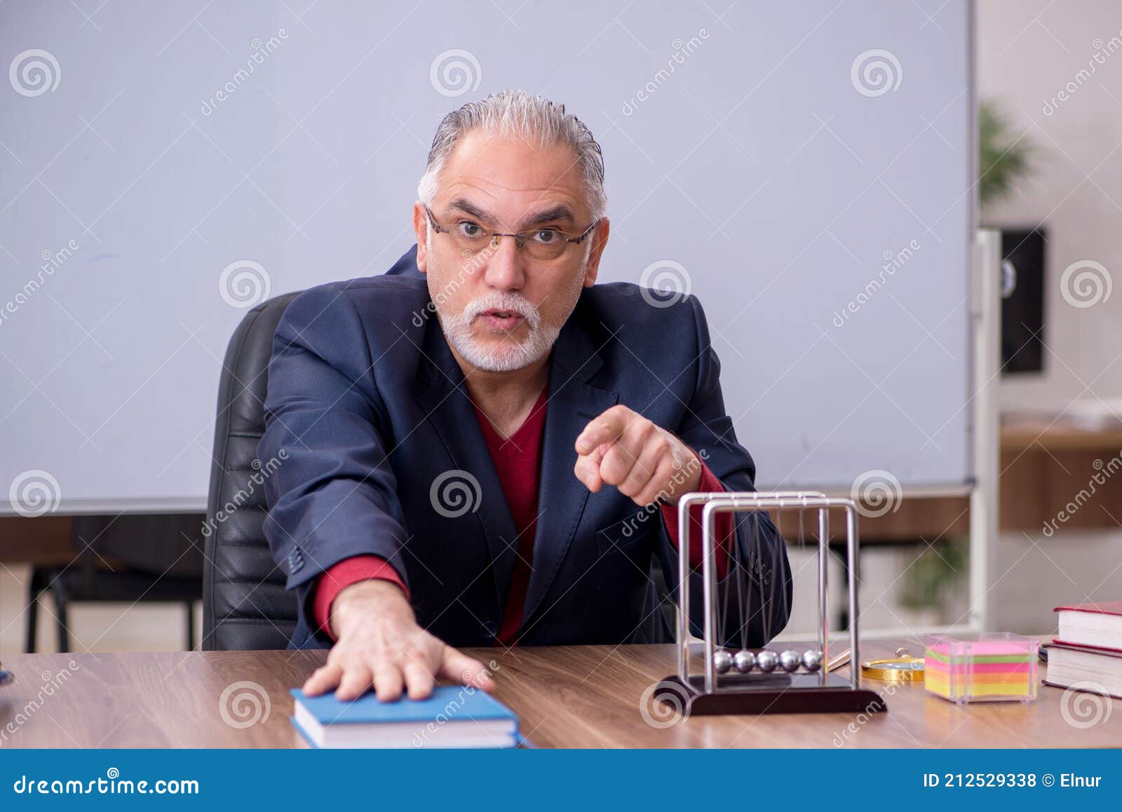 Old Teacher Physicist Sitting in the Classroom Stock Photo - Image of ...