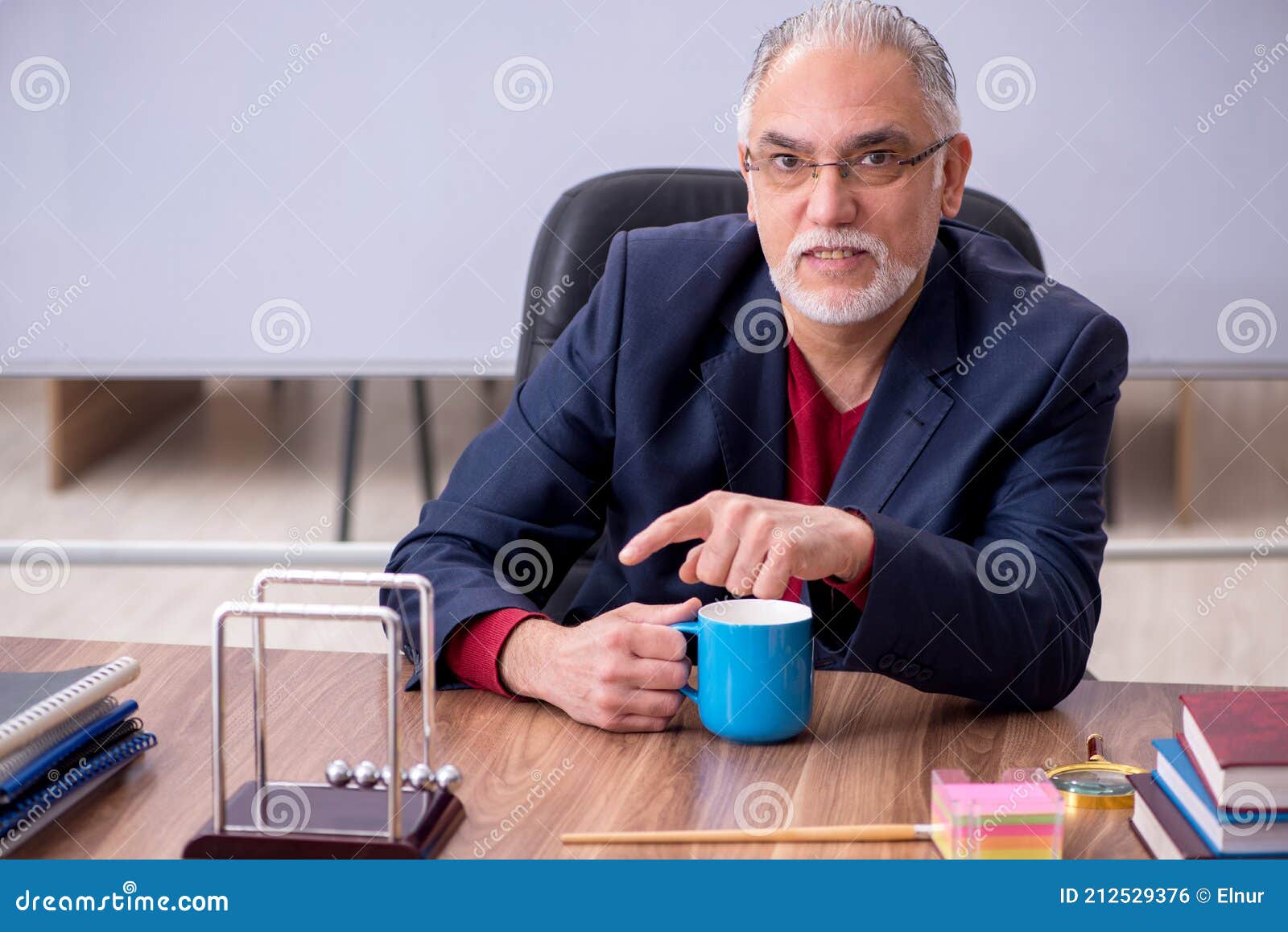 Old Teacher Physicist Sitting in the Classroom Stock Photo - Image of ...