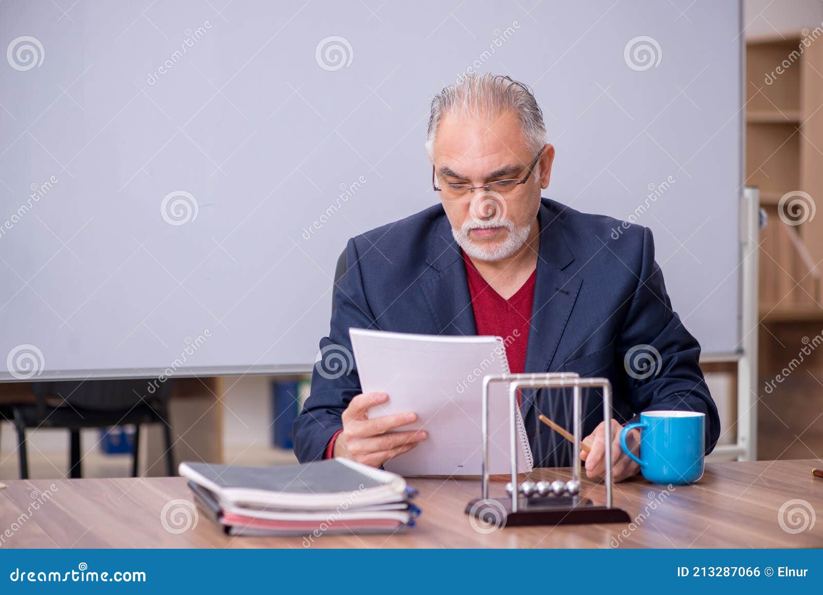 Old Teacher Physicist Sitting in the Classroom Stock Photo - Image of ...