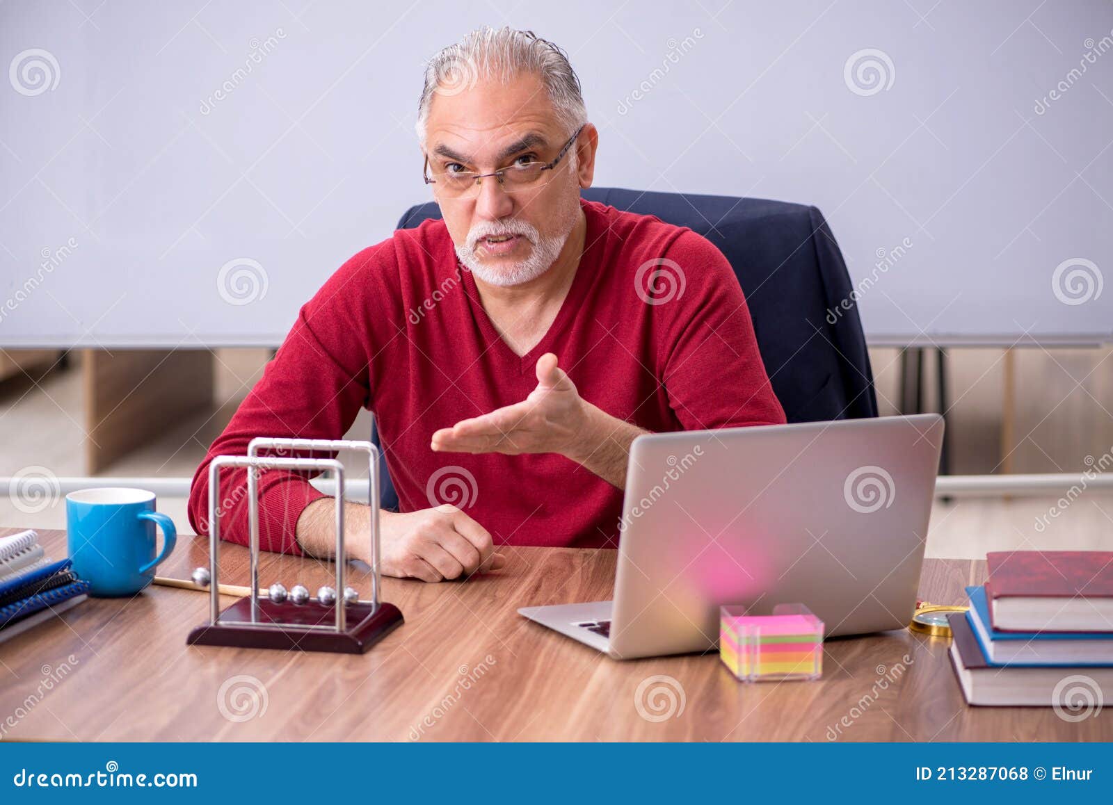 Old Teacher Physicist Sitting in the Classroom Stock Photo - Image of ...