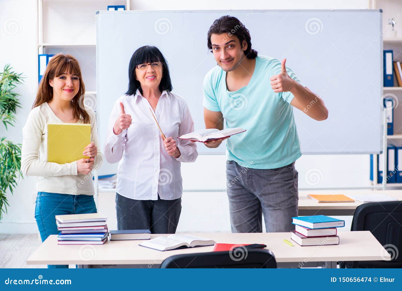 The Old Teacher and Students in the Classroom Stock Photo - Image of ...