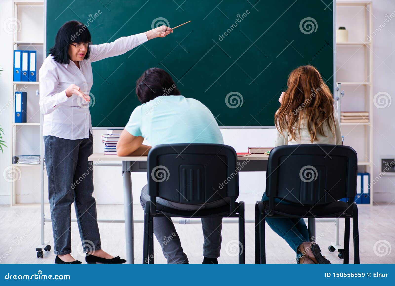 The Old Teacher and Students in the Classroom Stock Image - Image of ...