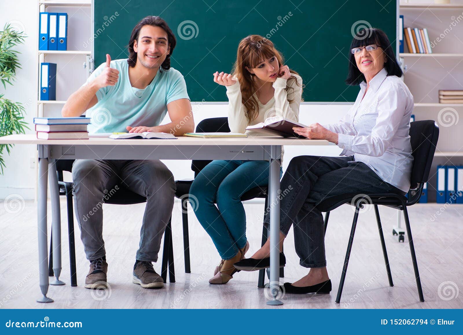 Old Teacher and Students in the Classroom Stock Photo - Image of ...