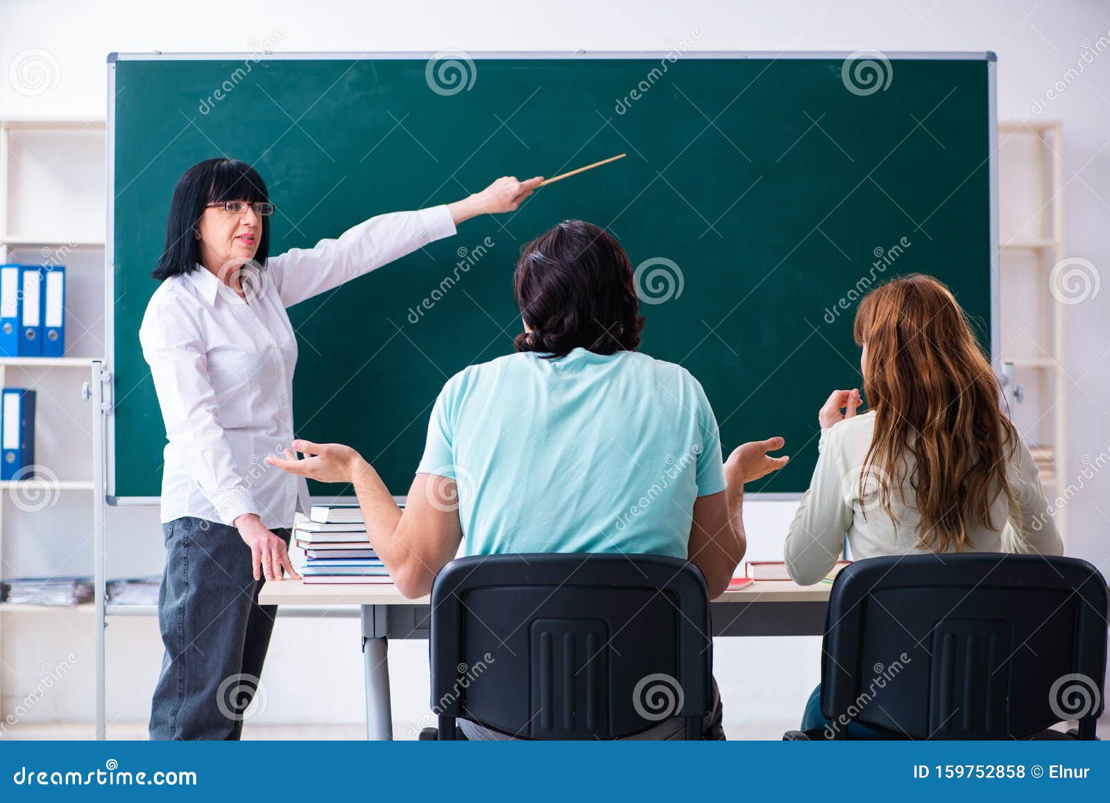 Old Teacher and Students in the Classroom Stock Photo - Image of ...