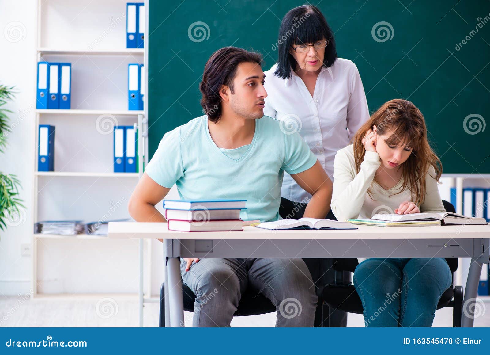 Old Teacher and Students in the Classroom Stock Photo - Image of green ...