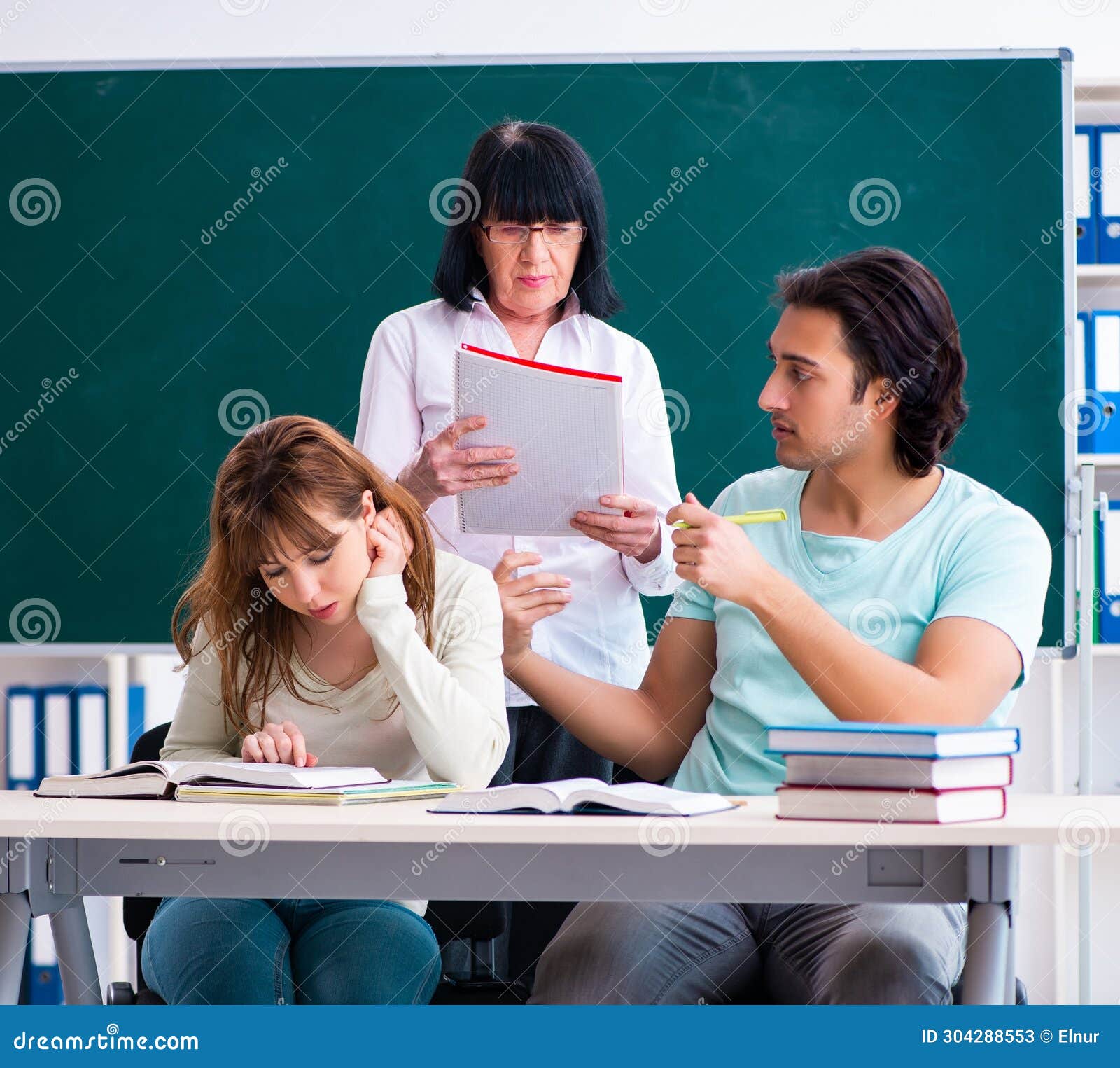 Old Teacher and Students in the Classroom Stock Image - Image of ...
