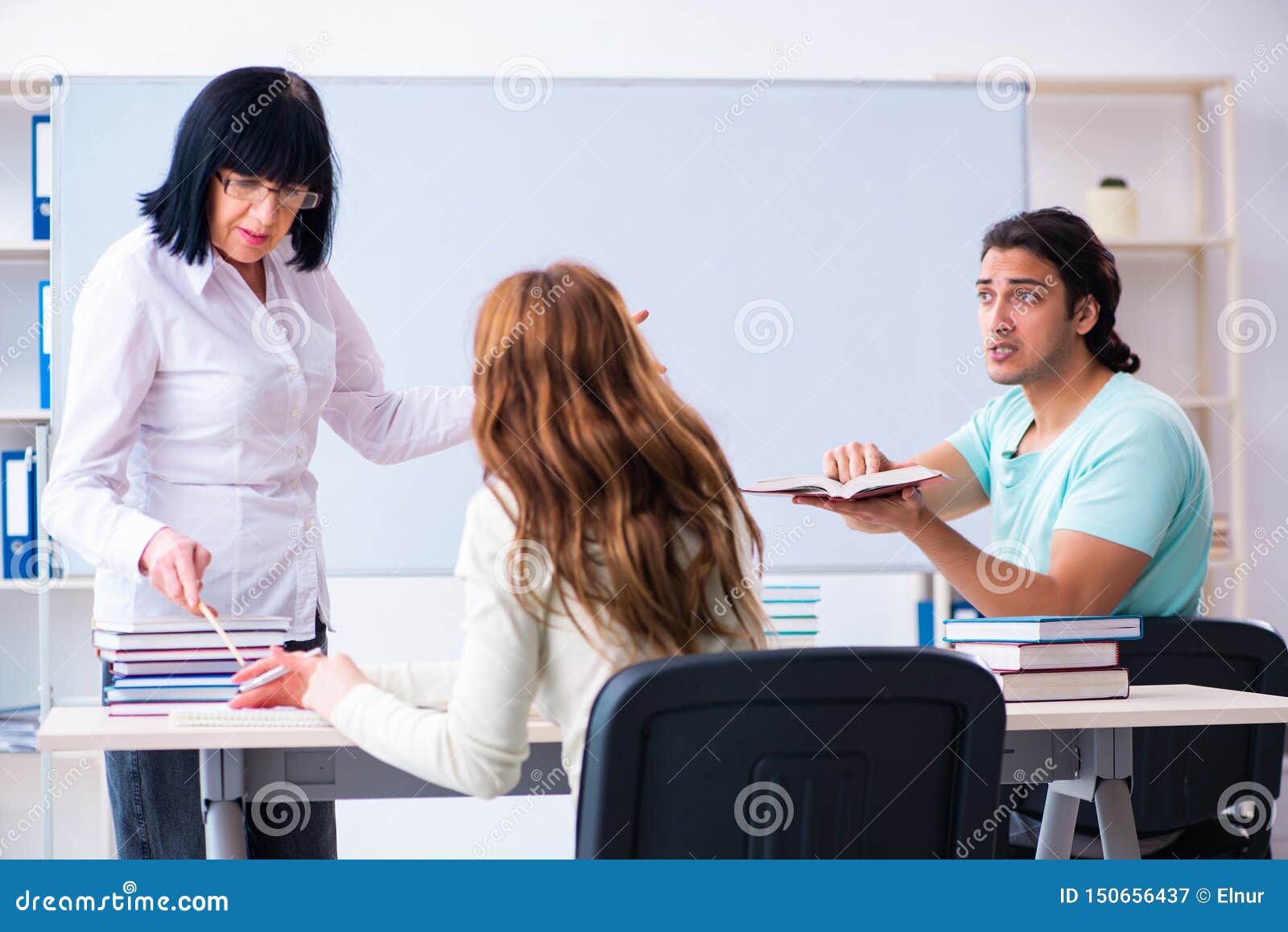 The Old Teacher and Students in the Classroom Stock Image - Image of ...