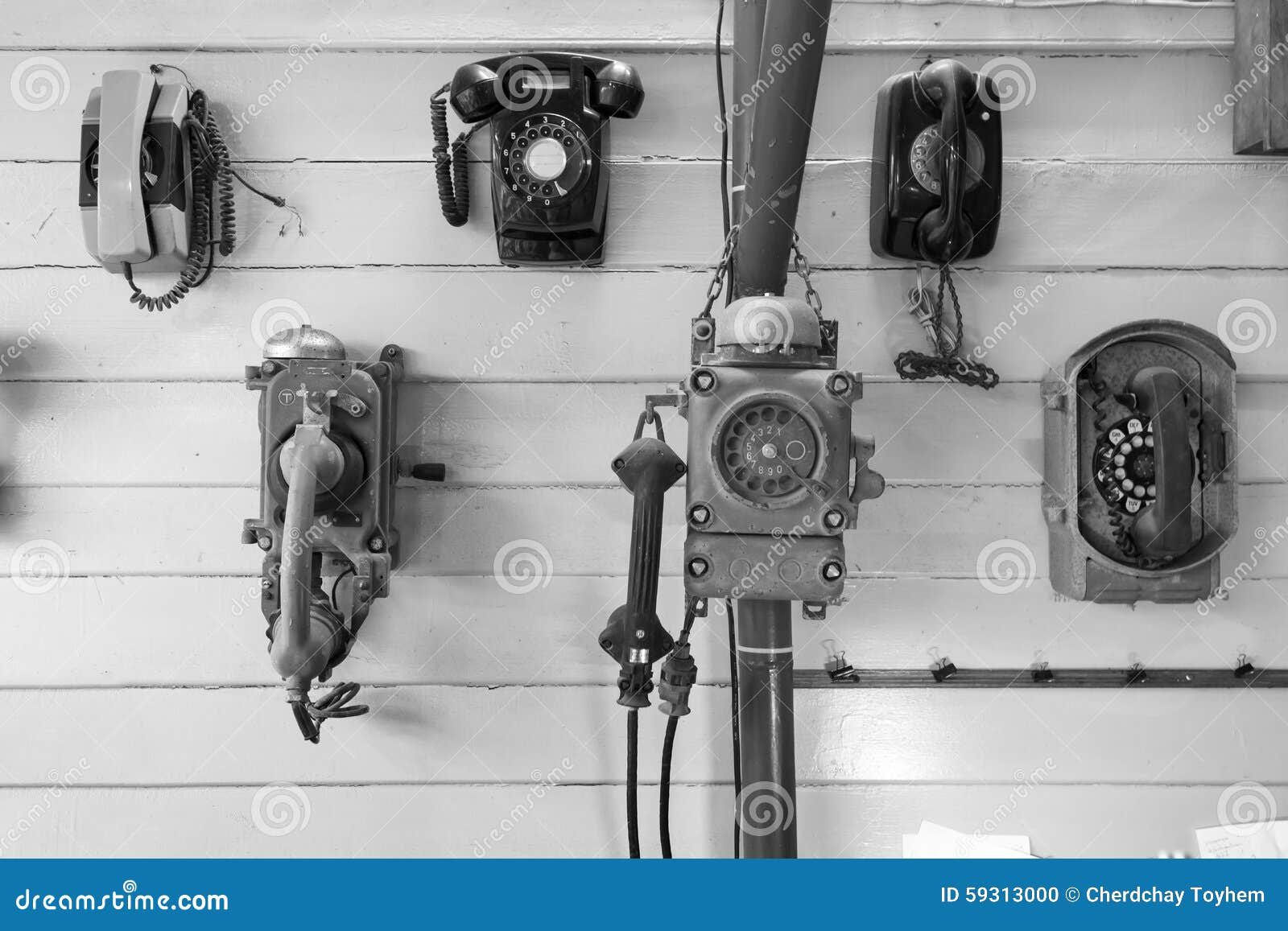 Old Telephone Collection on the Wall. Stock Photo - Image of ...