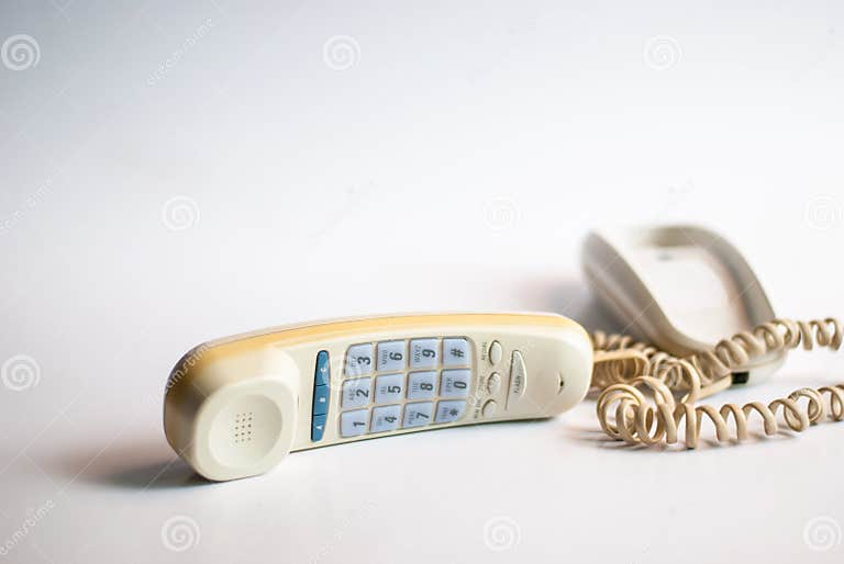 Old Telephone with the Earphone in the Front of the Frame, in a ...