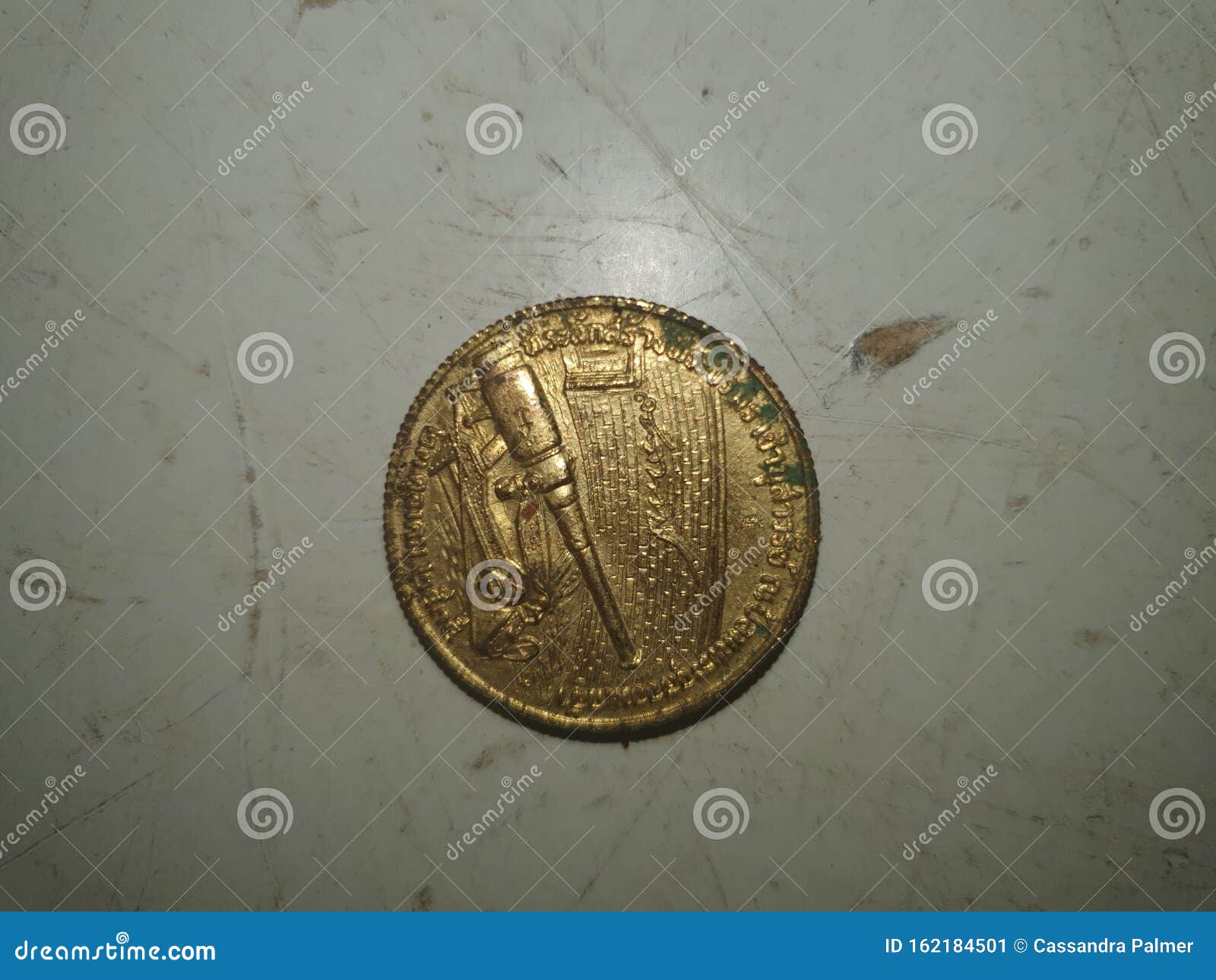 Old Thailand Coin with King on One Side and Cannon on Other Side Stock ...