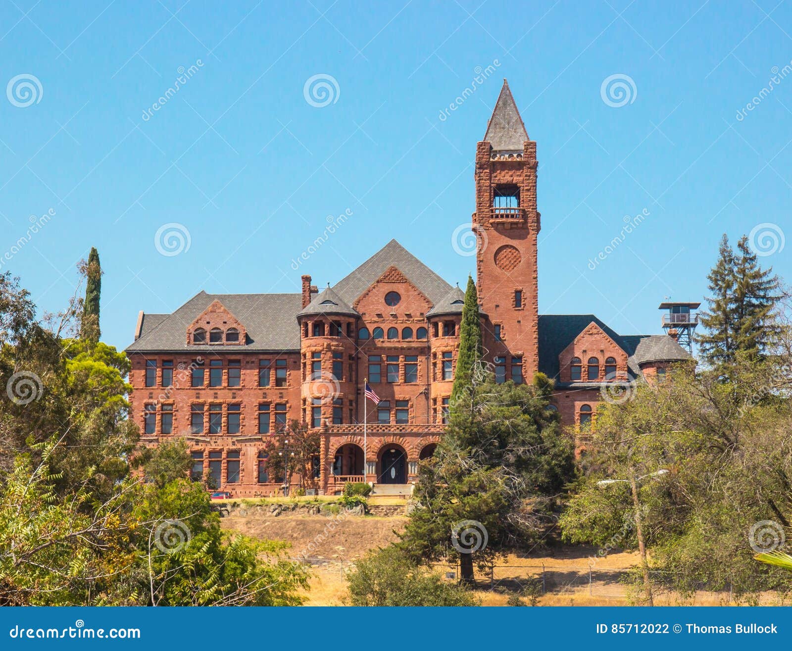 Old Three Story Brick Building Stock Photo - Image of vintage, roofs ...