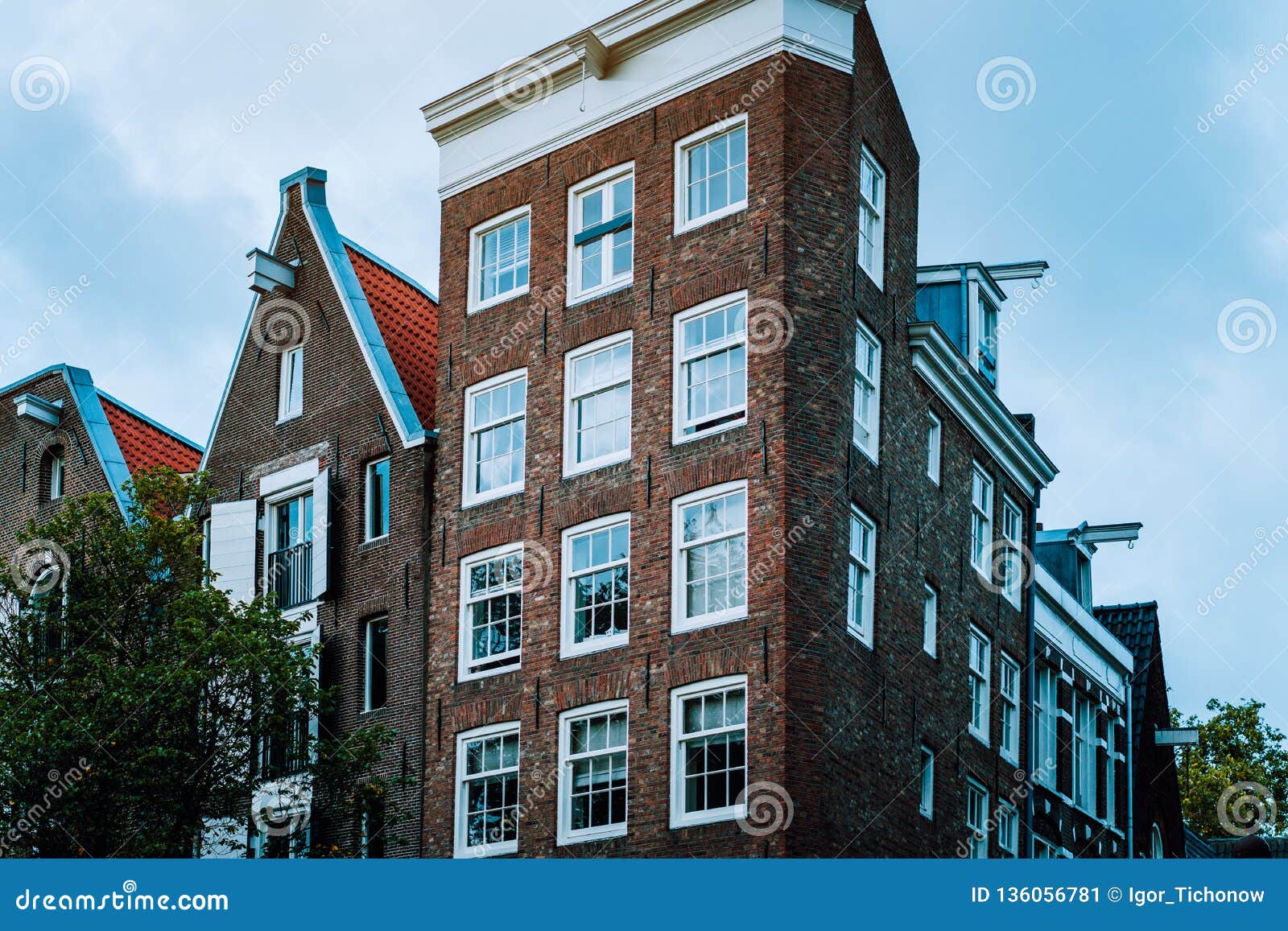Old Tilted Houses in Amsterdam. Unique Dutch Architecture Stock Image ...