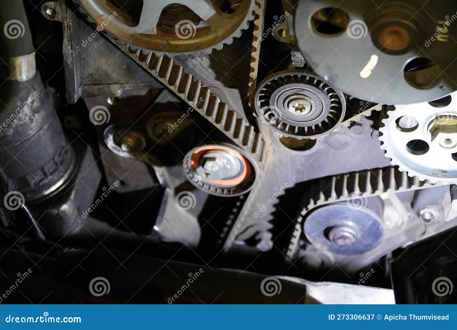 Old Timing Belt with Rollers Mounted on an Old Engine in the Garage ...