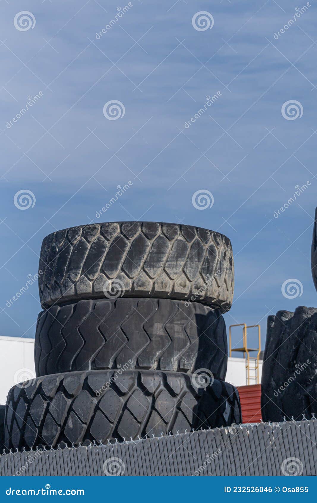 Old Tires Stacked Up Together at a Car Workshop Garage Stock Photo ...