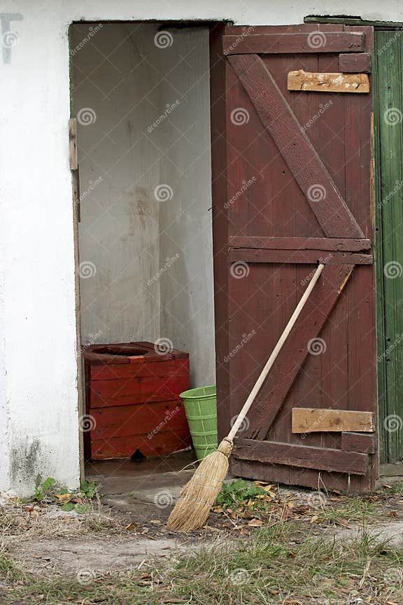 Open door of a old latrine stock image. Image of entrance - 19883739