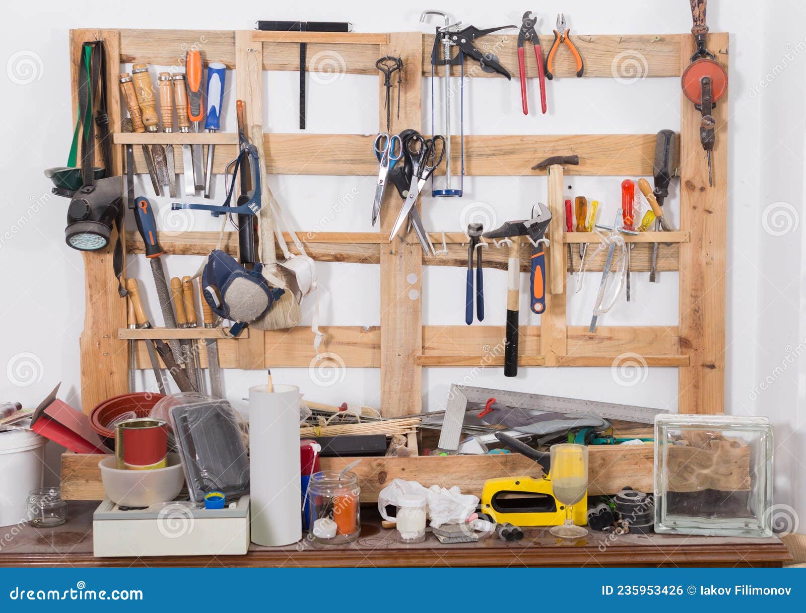 Old Tools Hanging on Wall in Workshop, Tool Shelf Against a Wall Stock ...