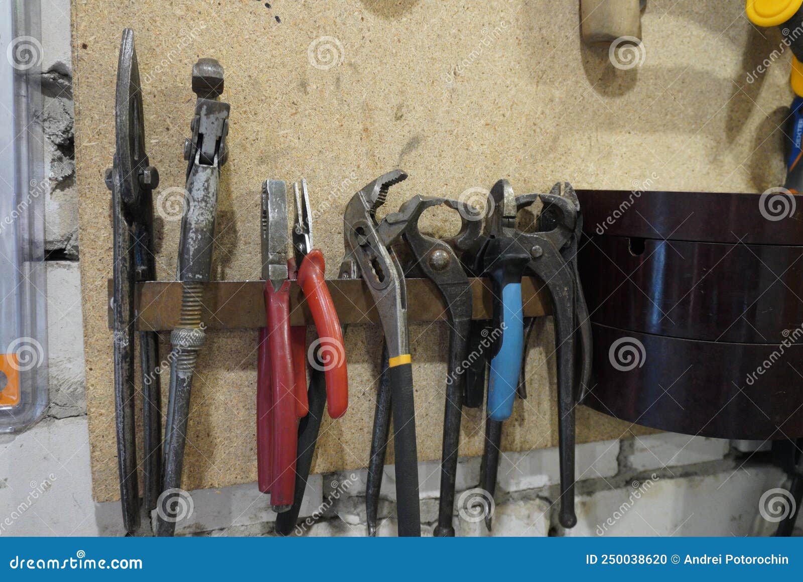 Old Tools Hanging on Wall in Workshop , Tool Shelf Against a Wall Stock ...