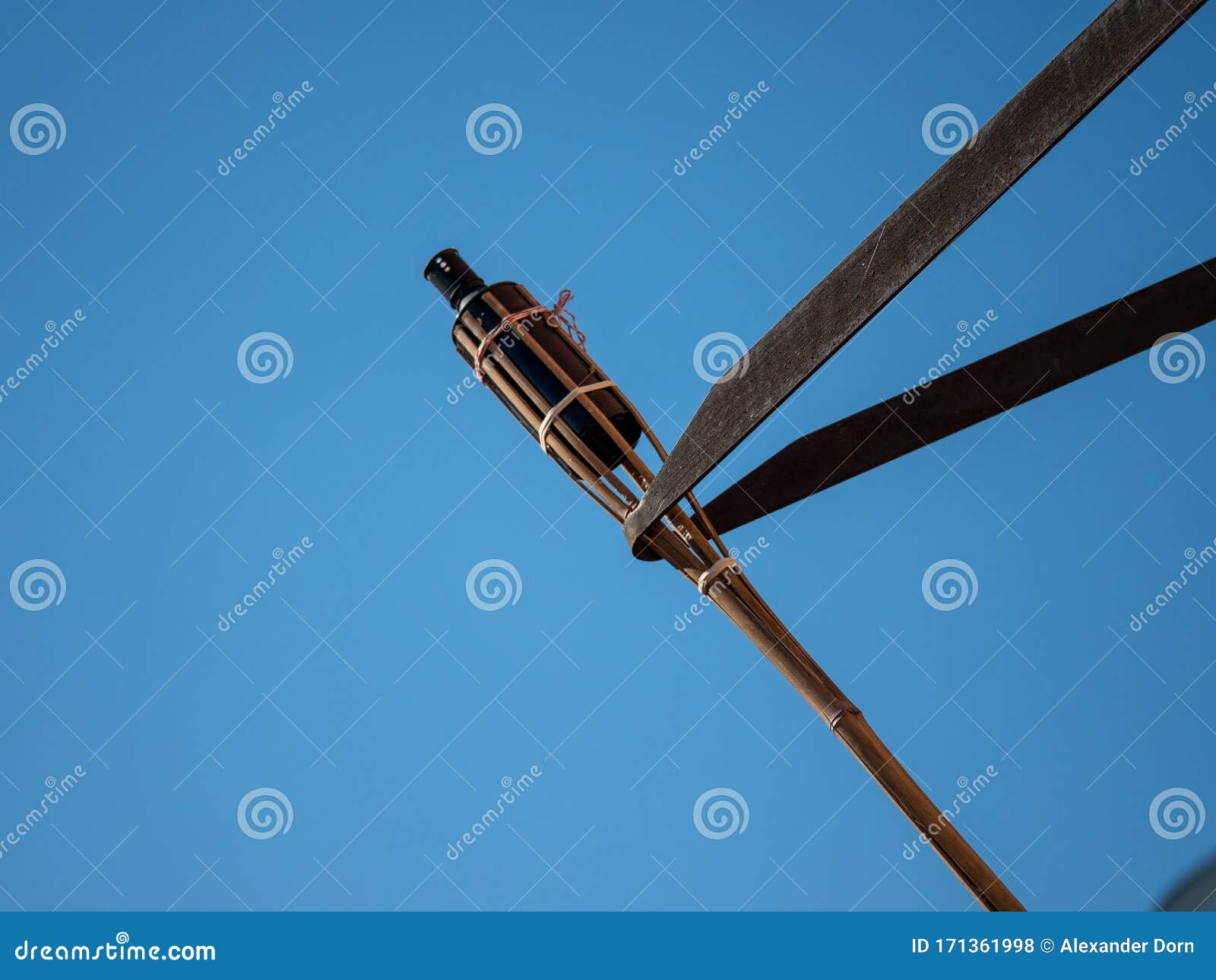 Old Torch with Blue Sky Background. Close Up Stock Photo - Image of ...