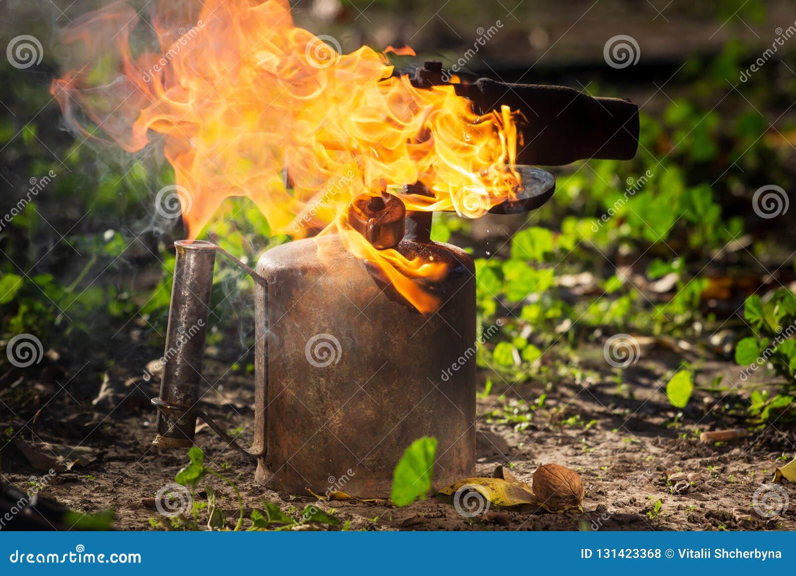 Old torch with a flame stock photo. Image of iron, vintage - 131423368