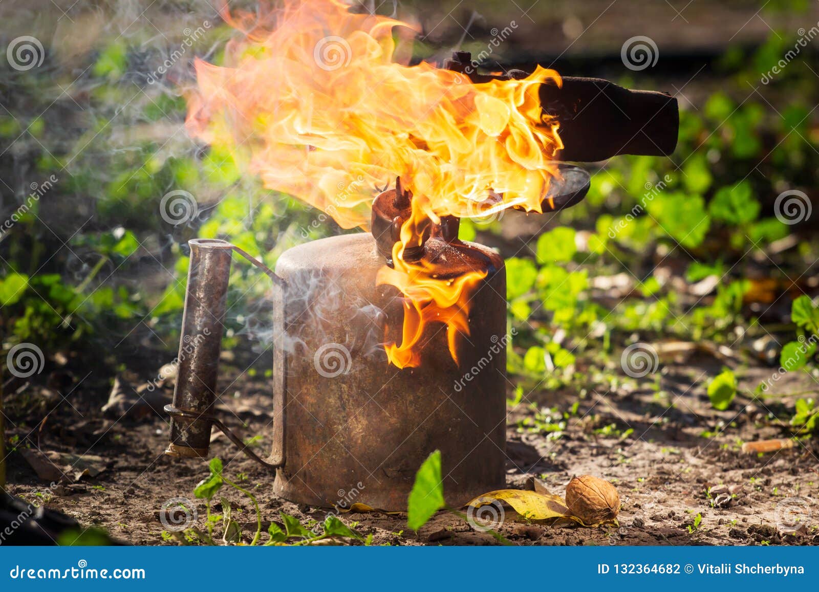 Old torch with a flame stock photo. Image of iron, blow - 132364682