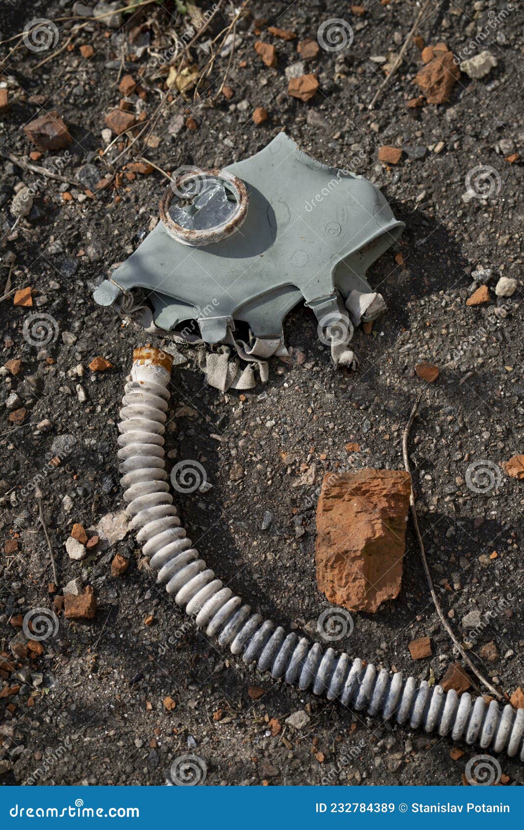 Old, Torn Gas Mask with Broken Glasses and a Torn Pipe Stock Image ...