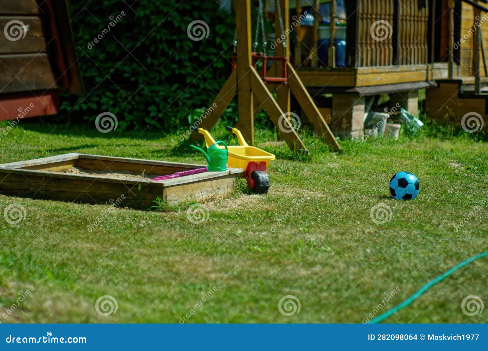 Old toys in the sandbox stock photo. Image of sandbox - 282098064