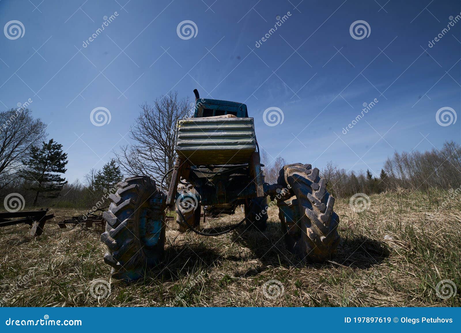 Old Tractor on the Grass Field Editorial Stock Image - Image of tractor ...