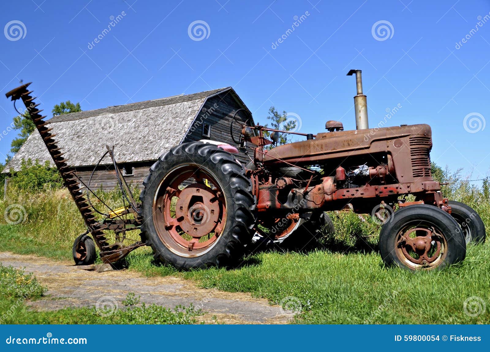 Old tractor with hay mower stock photo. Image of tractor - 59800054