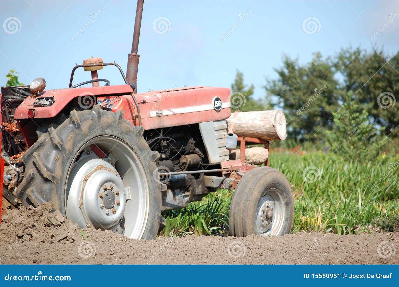 Old Tractor at work stock image. Image of countryside - 15580951