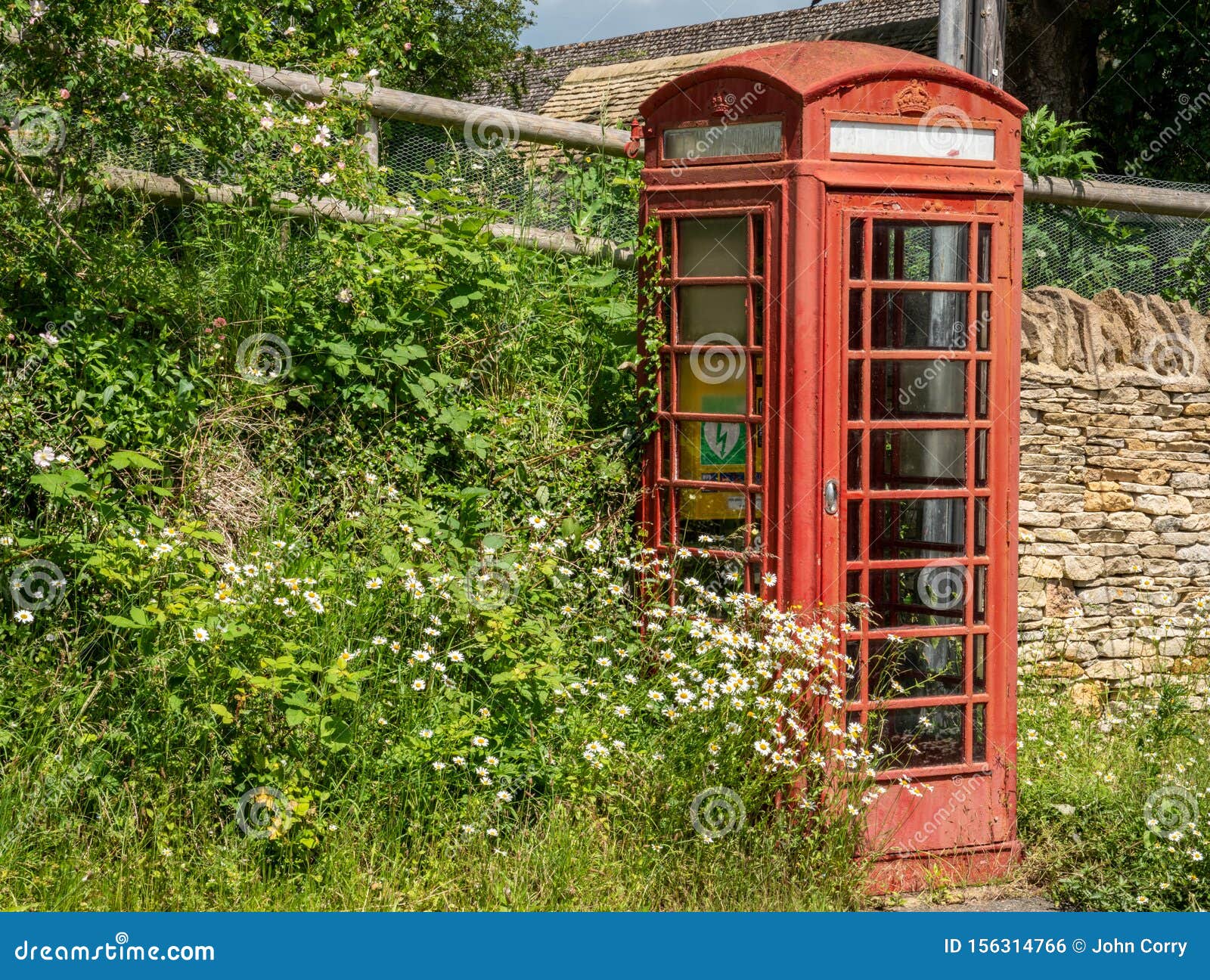 Old Traditional British Telephone Box in Naunton, the Cotswolds, UK ... Old Traditional British Telephone Box in Naunton, the Cotswolds, UK ...