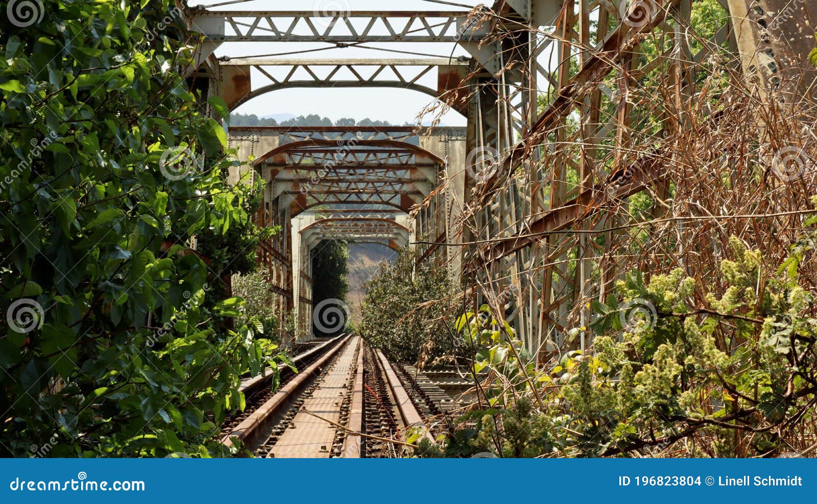 Old Train rail on a bridge stock photo. Image of colored - 196823804