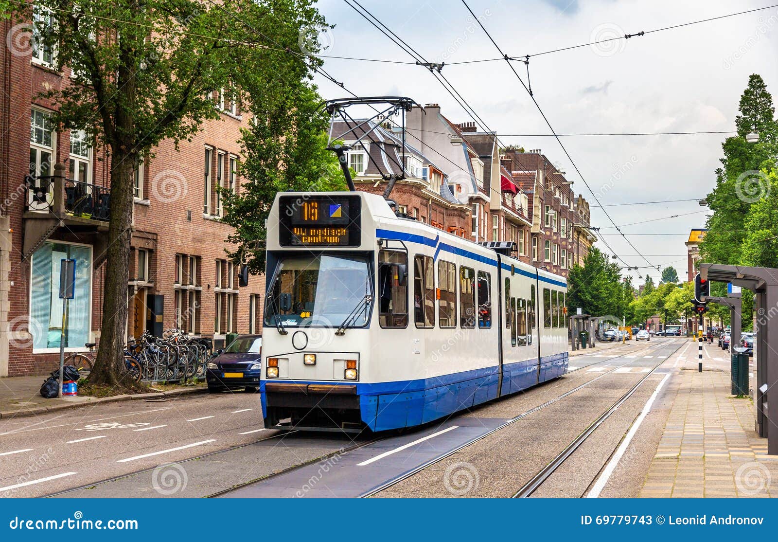 Old tram in Amsterdam stock image. Image of facade, ecology - 69779743