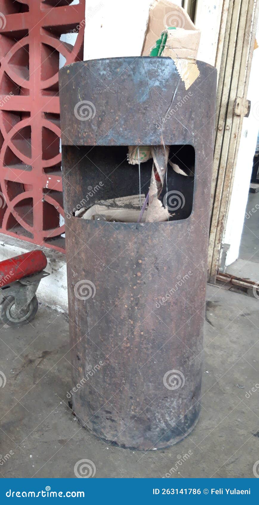 Old Trash Can in Front of the Store Stock Photo - Image of front, wood ...